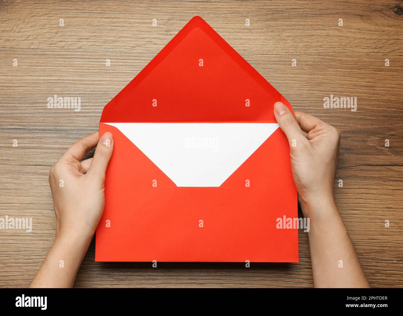 Woman opening letter hi-res stock photography and images - Alamy