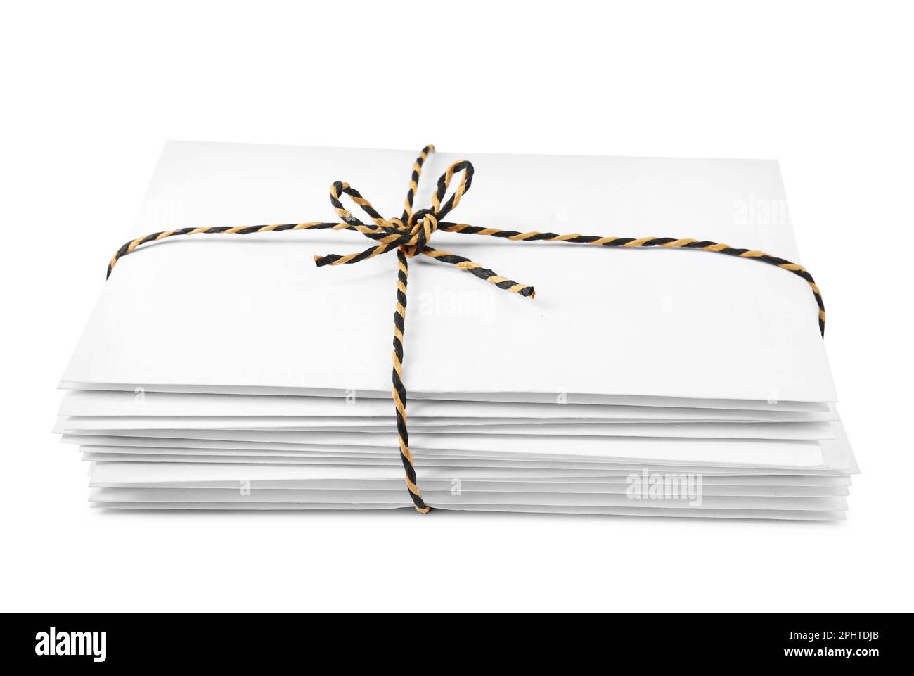 Stack of letters wrapped with rope on white background Stock Photo - Alamy