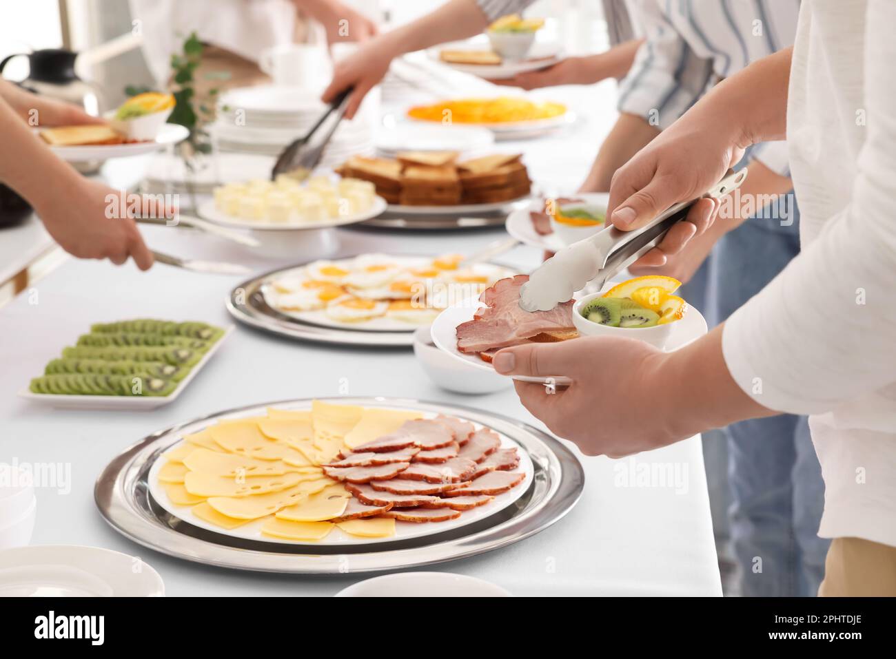 People taking food during breakfast, closeup. Buffet service Stock ...