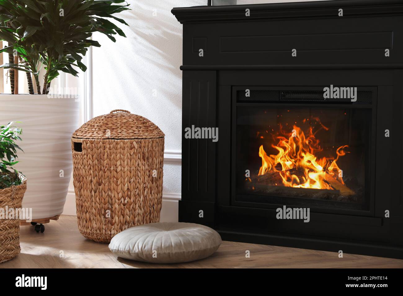 Electric fireplace and beautiful decor elements indoors. Interior ...
