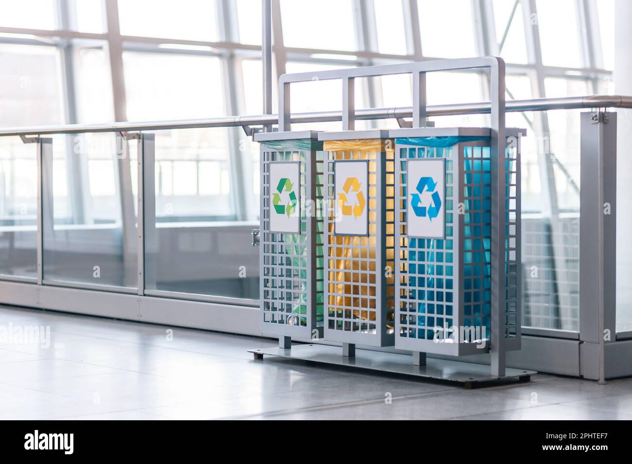 Color waste sorting bins indoors, space for text Stock Photo - Alamy