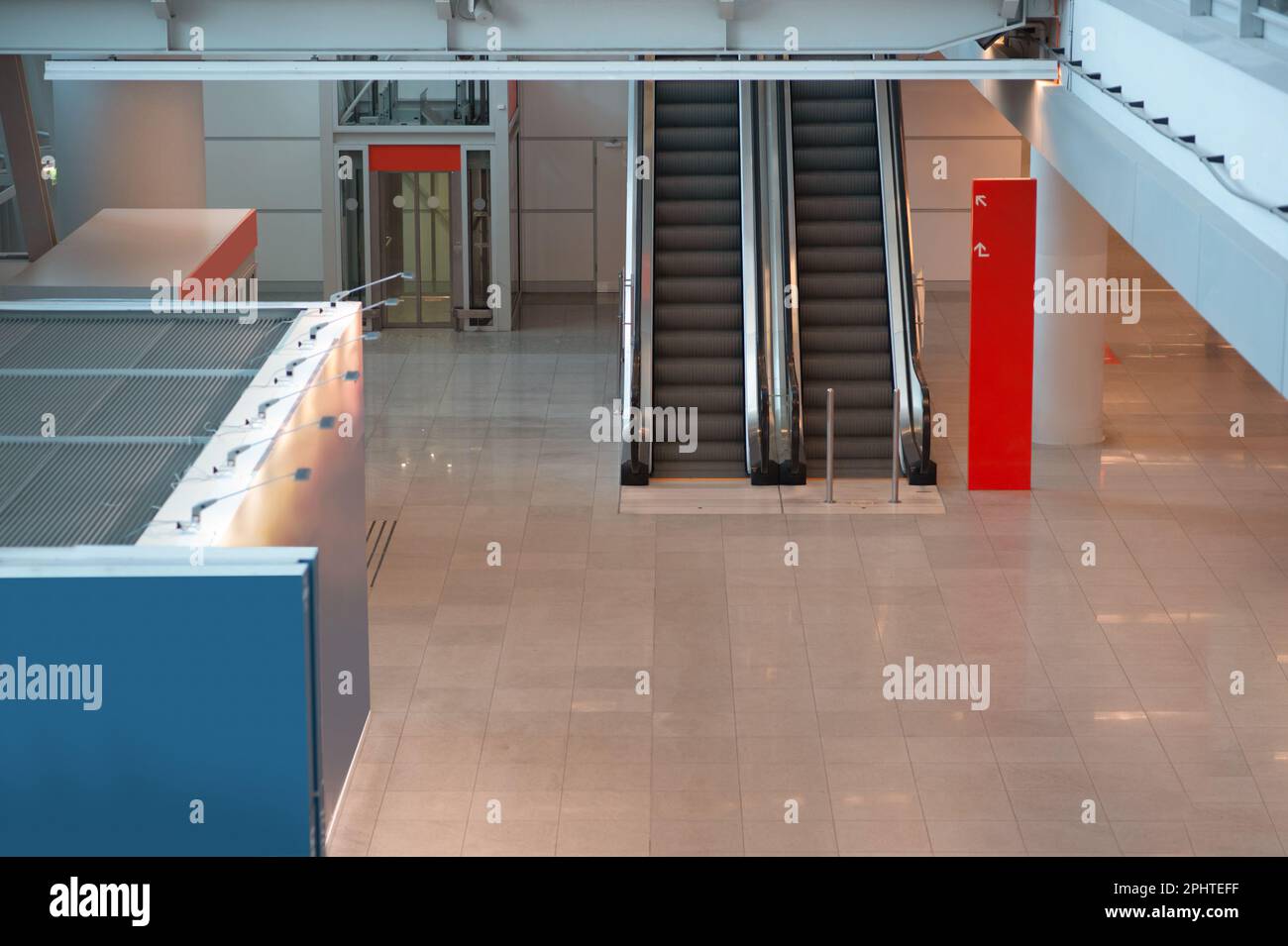 Interior of new airport terminal with escalators Stock Photo - Alamy