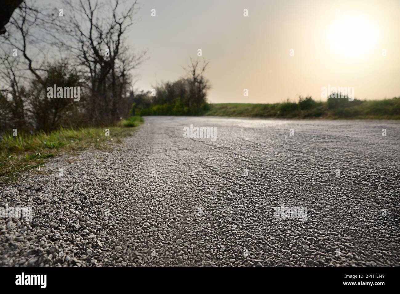 Asphalt road in countryside on sunny day, ground level view Stock Photo ...