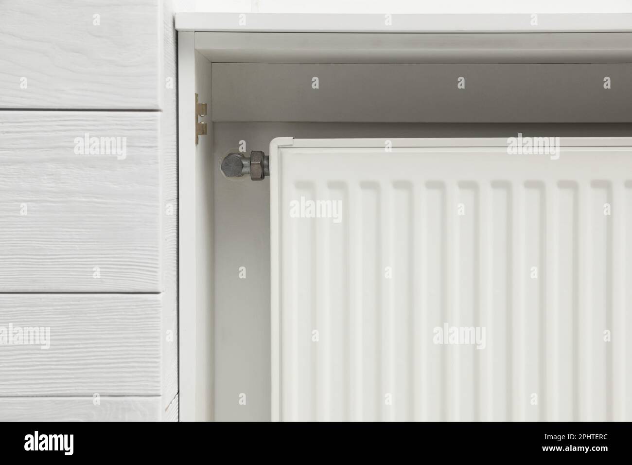 Closeup view of modern radiator. Central heating system Stock Photo - Alamy