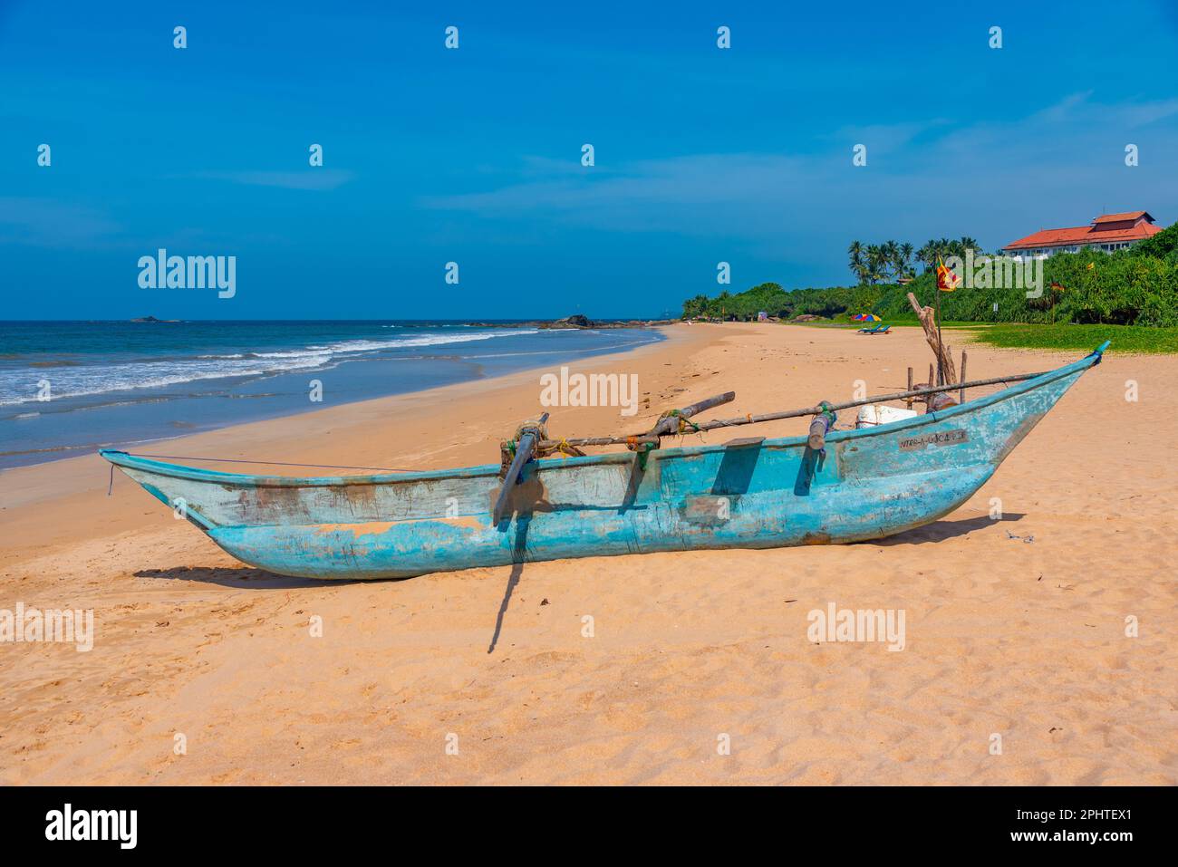 Fishing boat on a beach at Bentota, Sri Lanka Stock Photo - Alamy