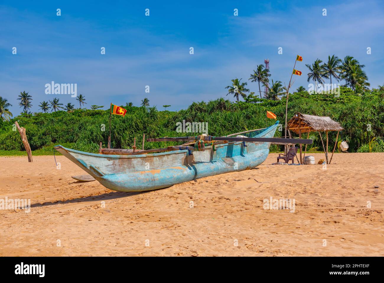 Fishing boat on a beach at Bentota, Sri Lanka Stock Photo - Alamy