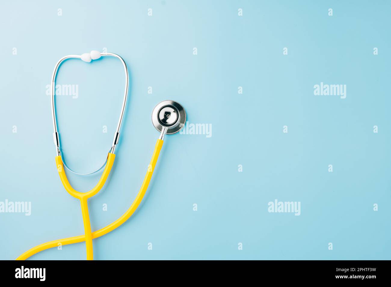 Yellow medical stethoscope isolated Stock Photo - Alamy