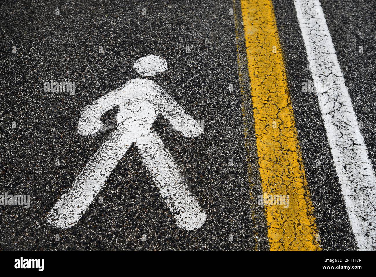 Pedestrian area sign and road lines painted on asphalt outdoors Stock ...