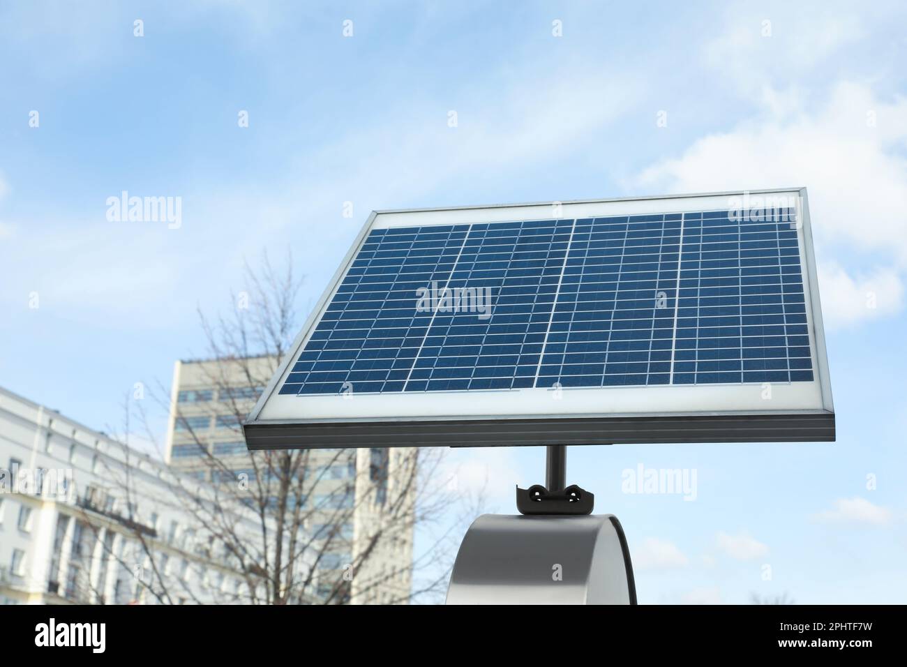 Small solar panel on city street. Alternative energy Stock Photo - Alamy