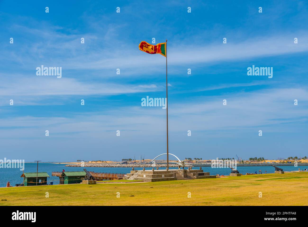 Flagpole with Sri Lankan flag waving over Galle Face Green park at ...