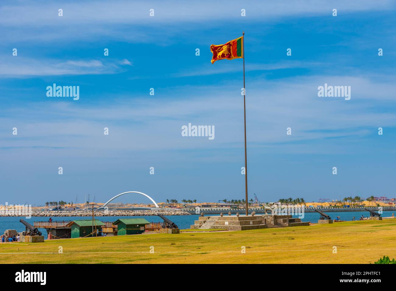 Flagpole with Sri Lankan flag waving over Galle Face Green park at ...