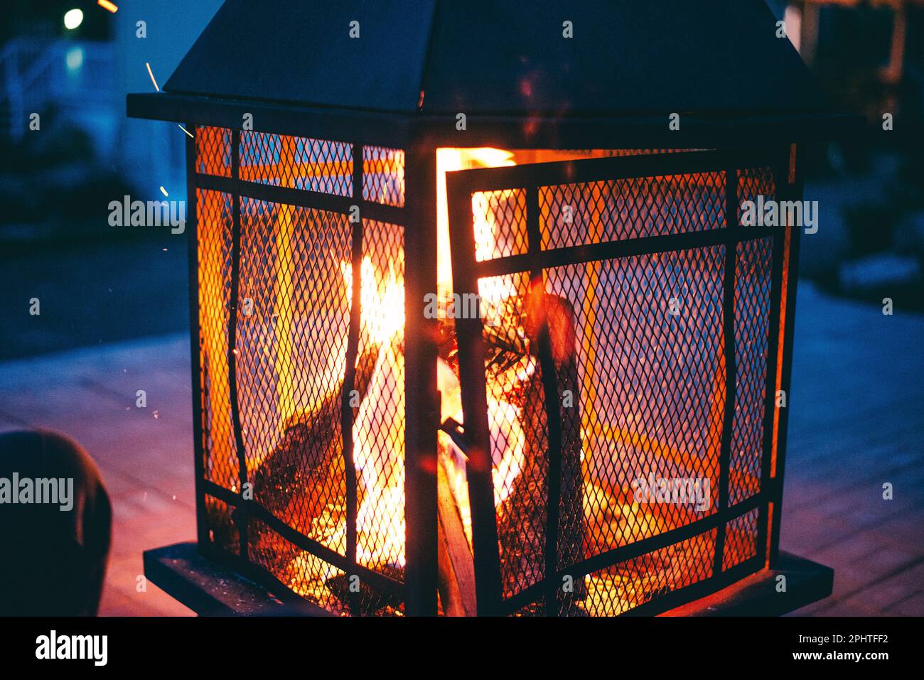 Bright fire crackling in a fire pit at night Stock Photo - Alamy