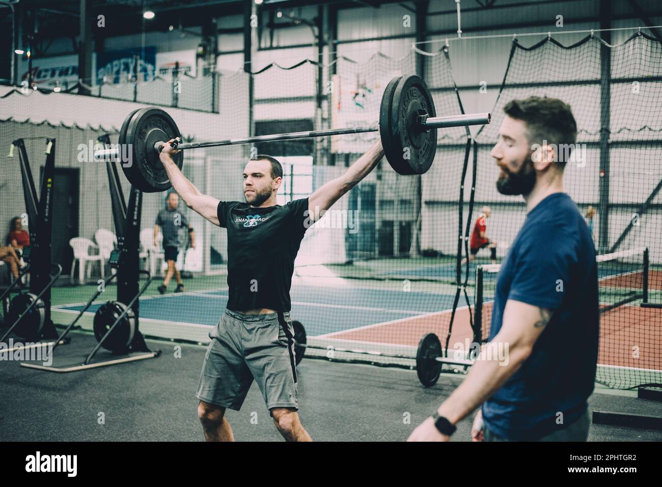 A man lifting hi-res stock photography and images - Alamy