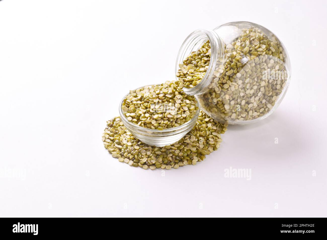 Raw green moong split isolated on white background Stock Photo - Alamy