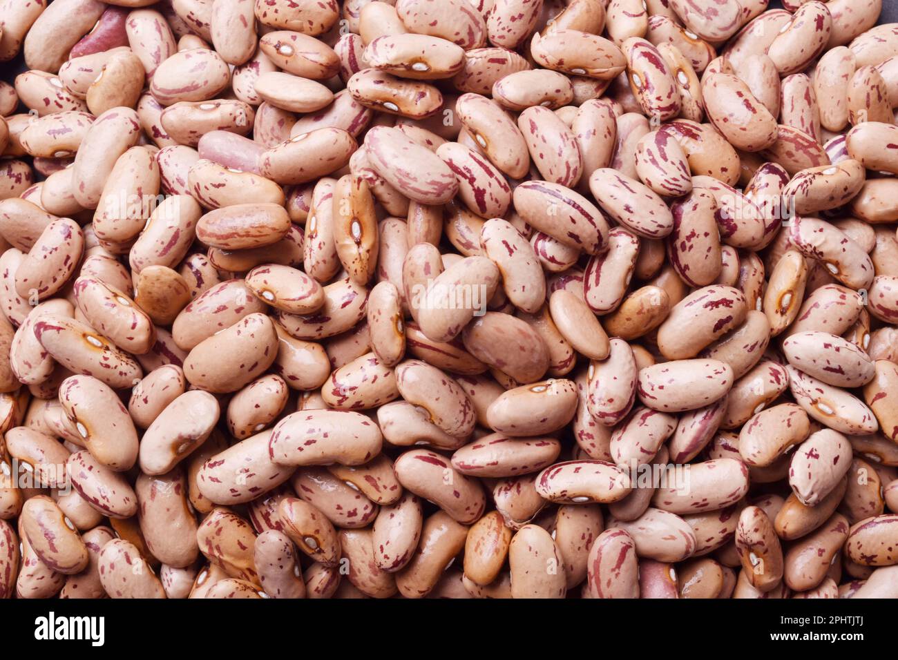 Top view of raw pinto beans texture background Stock Photo - Alamy