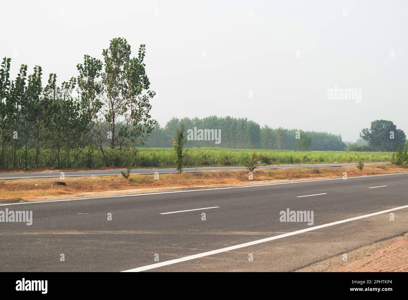 Clean highway road at rural village area in india Stock Photo - Alamy