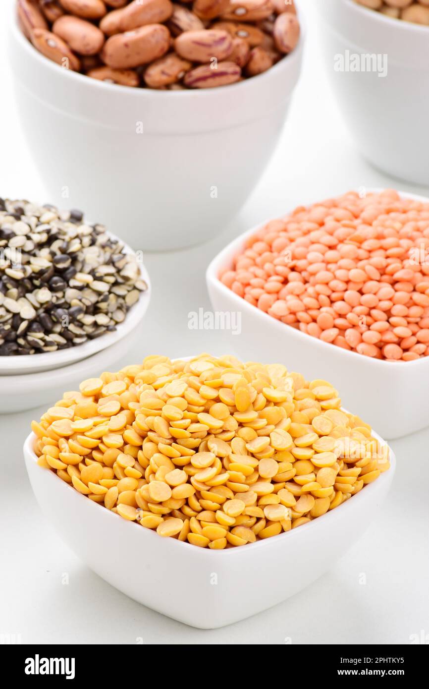 Raw chana dal in bowl on white background Stock Photo - Alamy