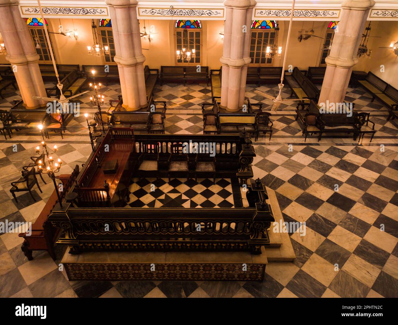 Interior of a synagogue with bimah in middle. Synagogue is Jewish house ...