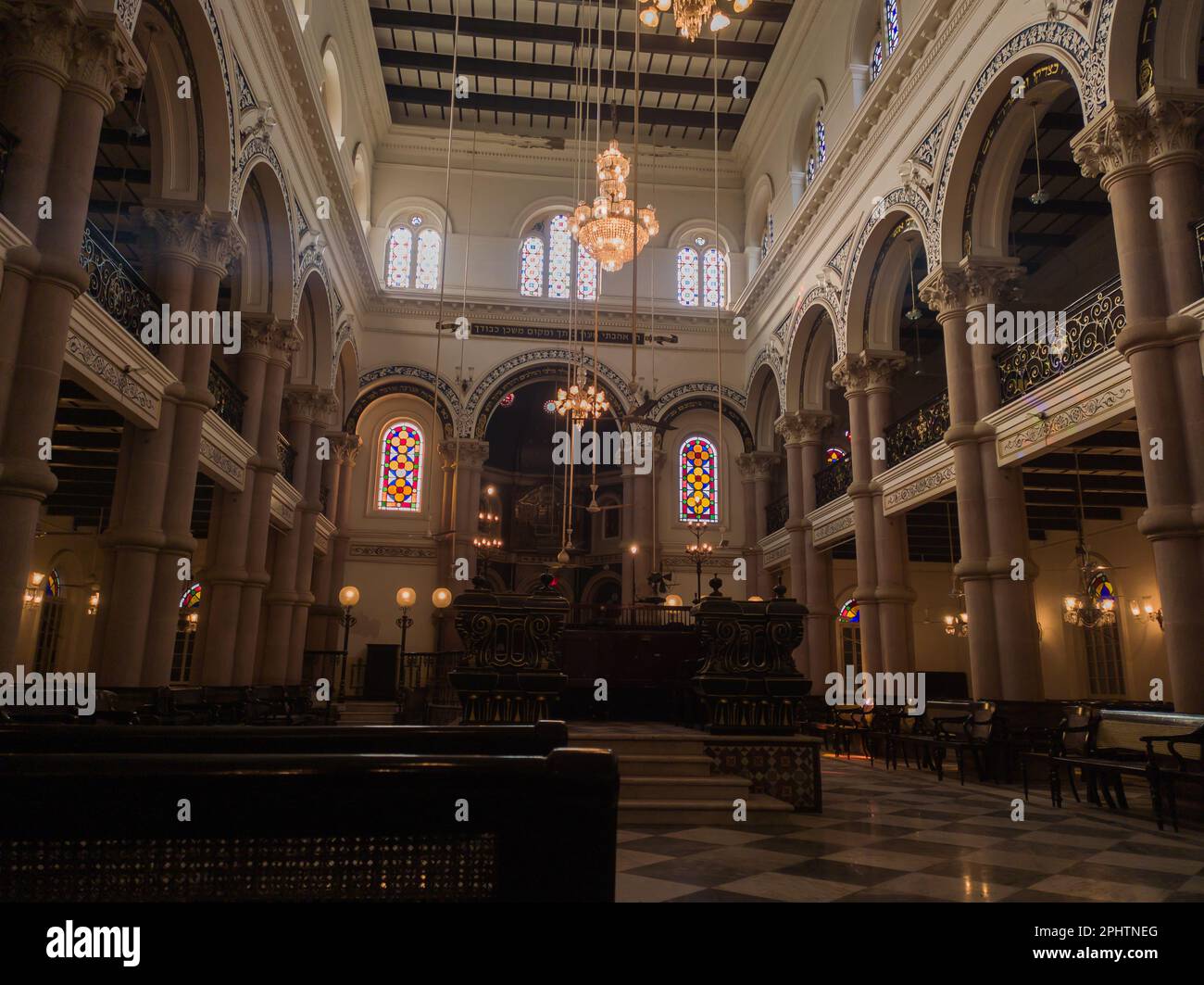 Interior of a synagogue with bimah in middle. Synagogue is Jewish house ...