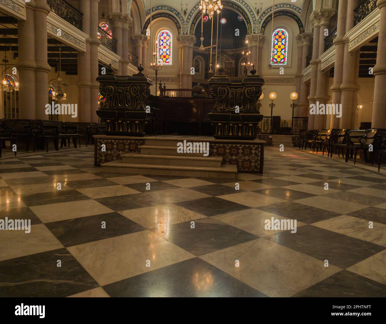 Interior of a synagogue with bimah in middle. Synagogue is Jewish house ...