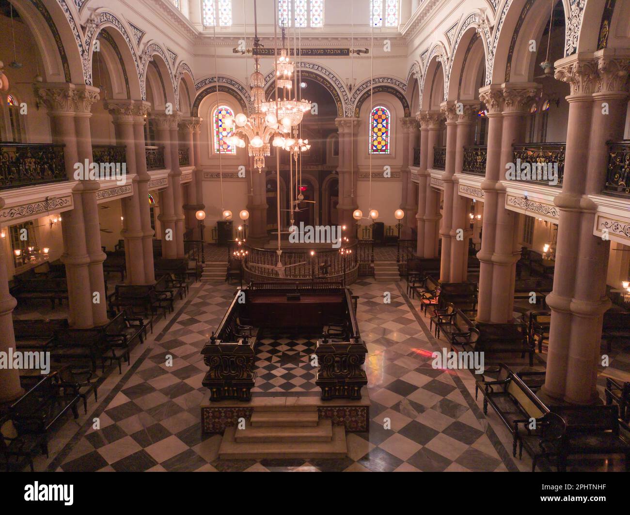 Interior of a synagogue with bimah in middle. Synagogue is Jewish house ...