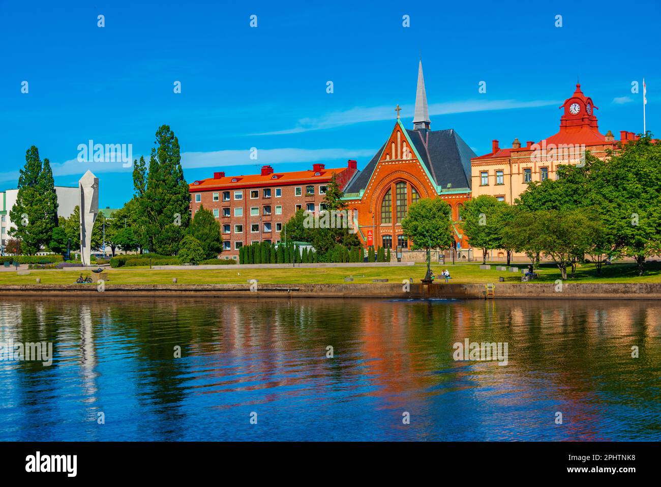 Statue of a woman at Picasso park and Immanuel church in Swedish town ...