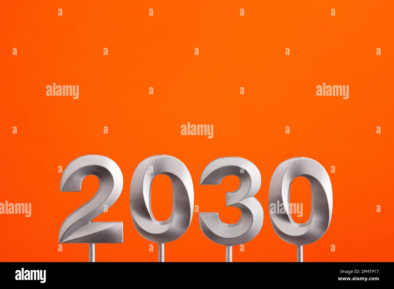 Year 2030 - Silver number on orange foamy background Stock Photo - Alamy