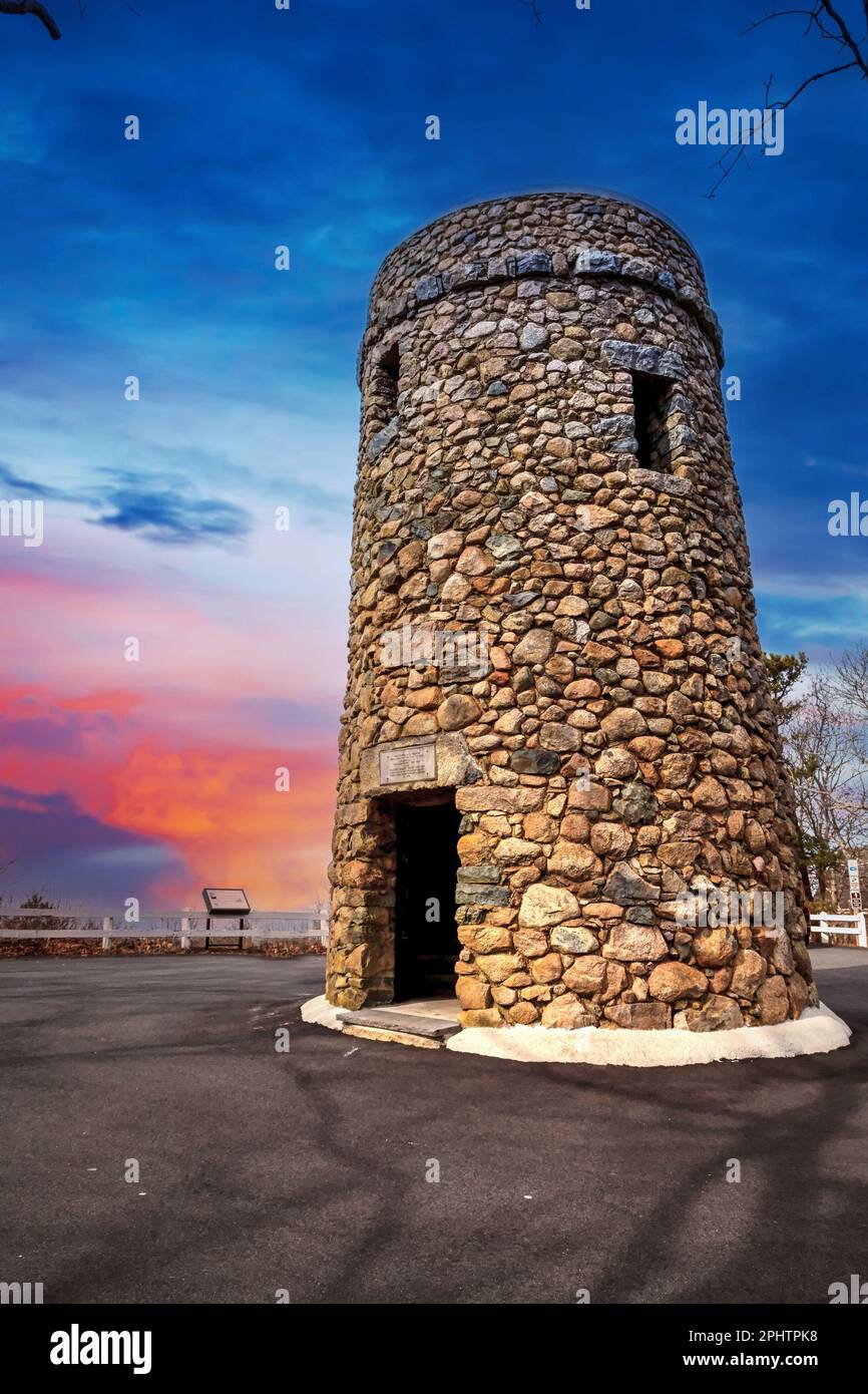 Sunset over Tall cobblestone structure of Scargo Tower in Dennis, Cape ...