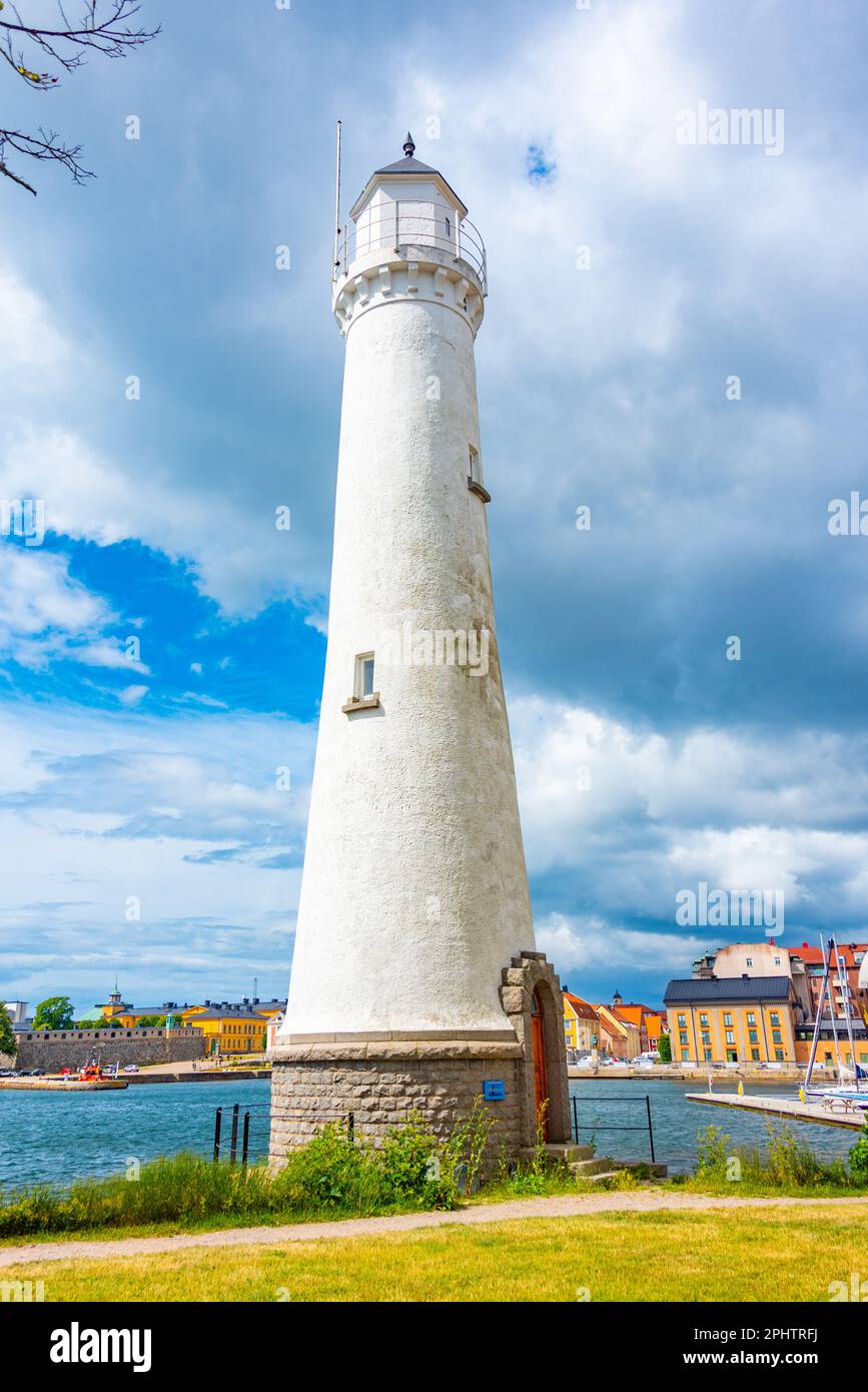Lighthouse at traditional port buildings in Karlshamn, Sweden Stock ...