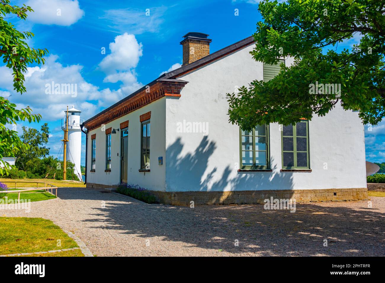 Lighthouse at traditional port buildings in Karlshamn, Sweden Stock ...