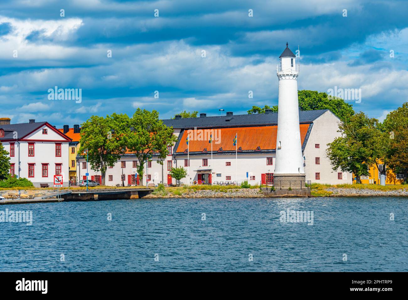Lighthouse at traditional port buildings in Karlshamn, Sweden Stock ...