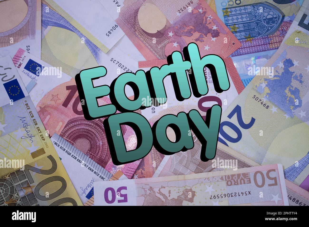 Earth Day word with money. Paper currency background with different ...