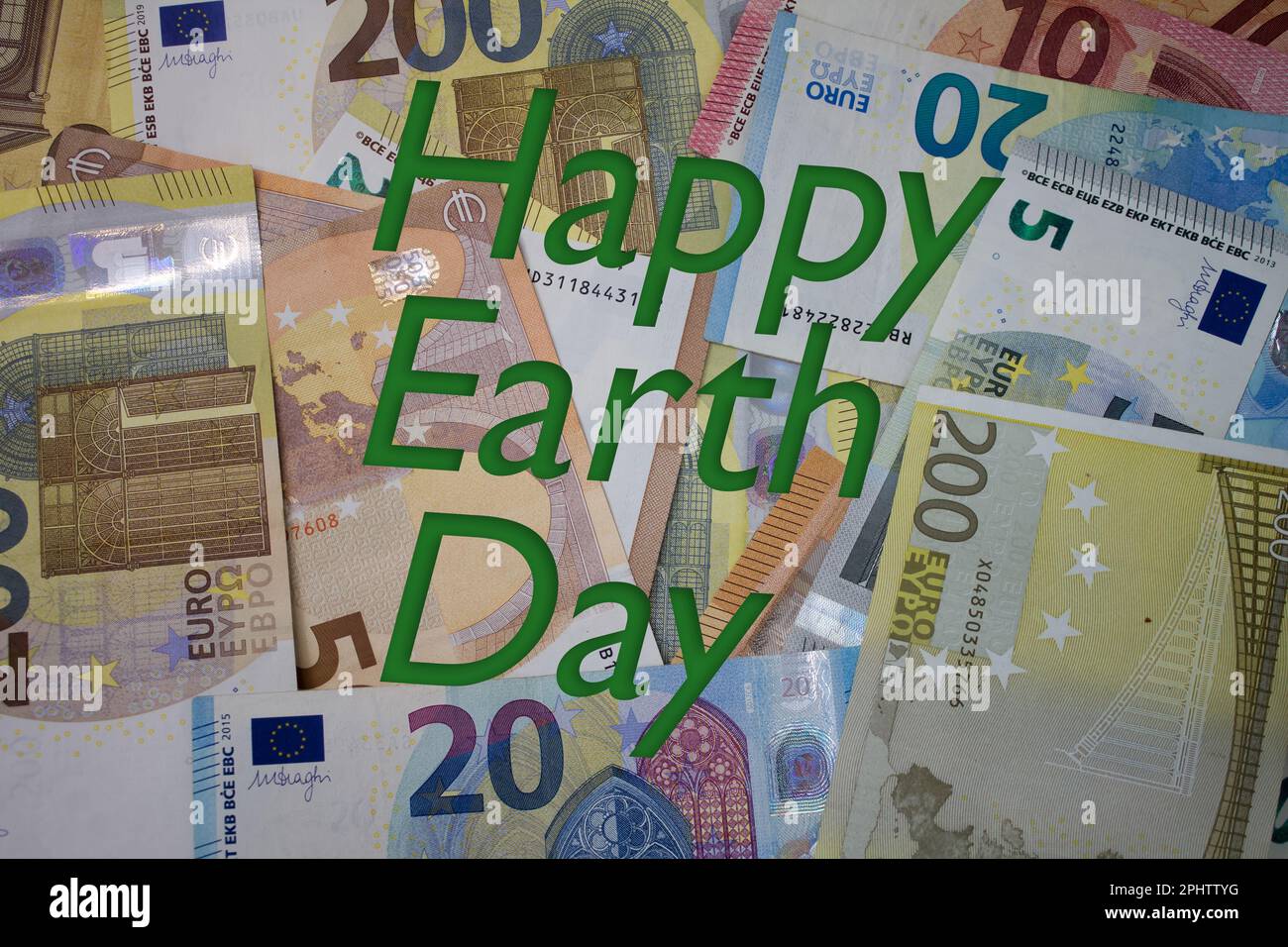 Earth Day word with money. Paper currency background with different ...
