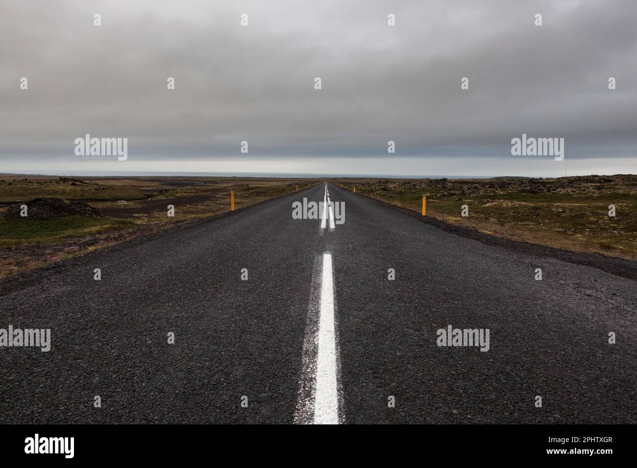 Iceland road leading straight to the horizon. Empty straight road line ...