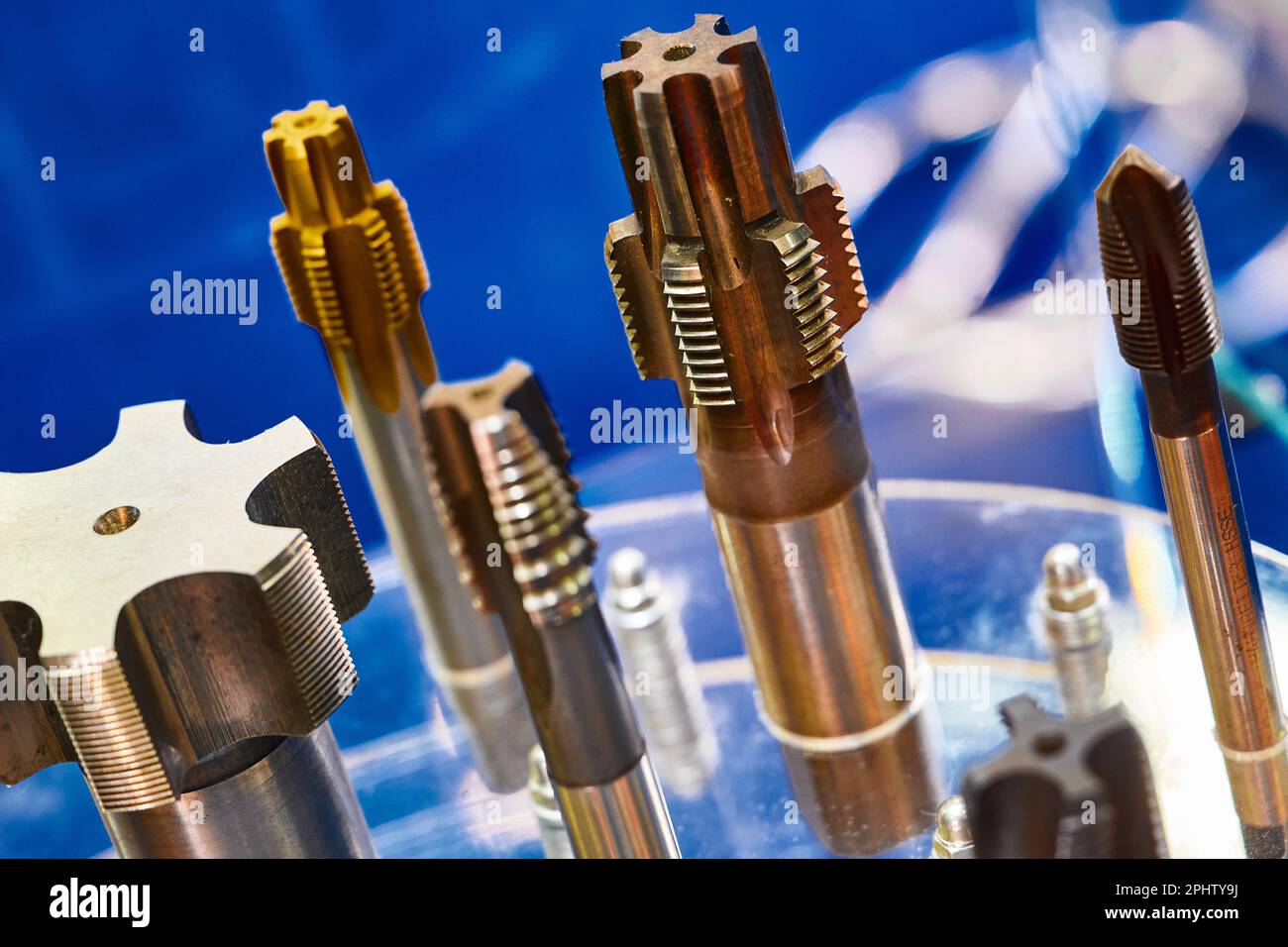 Various size roll forming taps exposed in hardware store Stock Photo ...