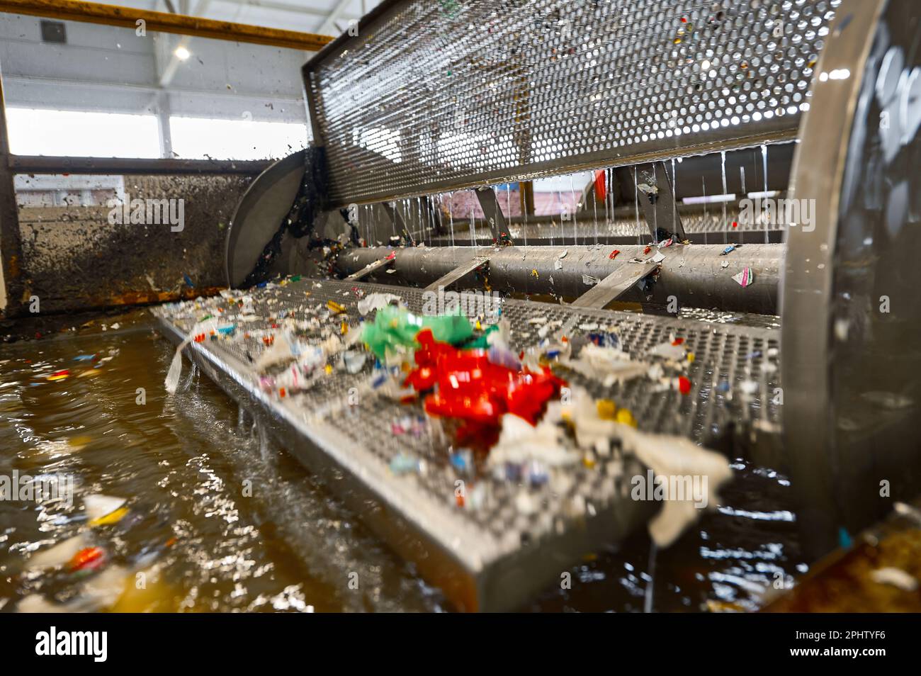 Automatic washing machine for shredded garbage plastic. Close-up of ...