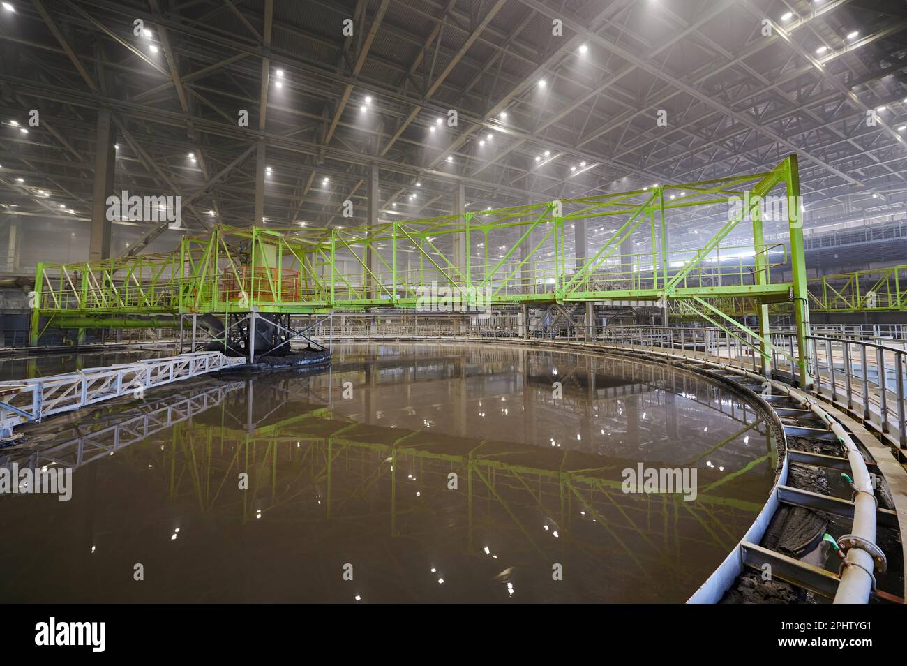 Huge container to separate liquid pulp material in workshop Stock Photo ...