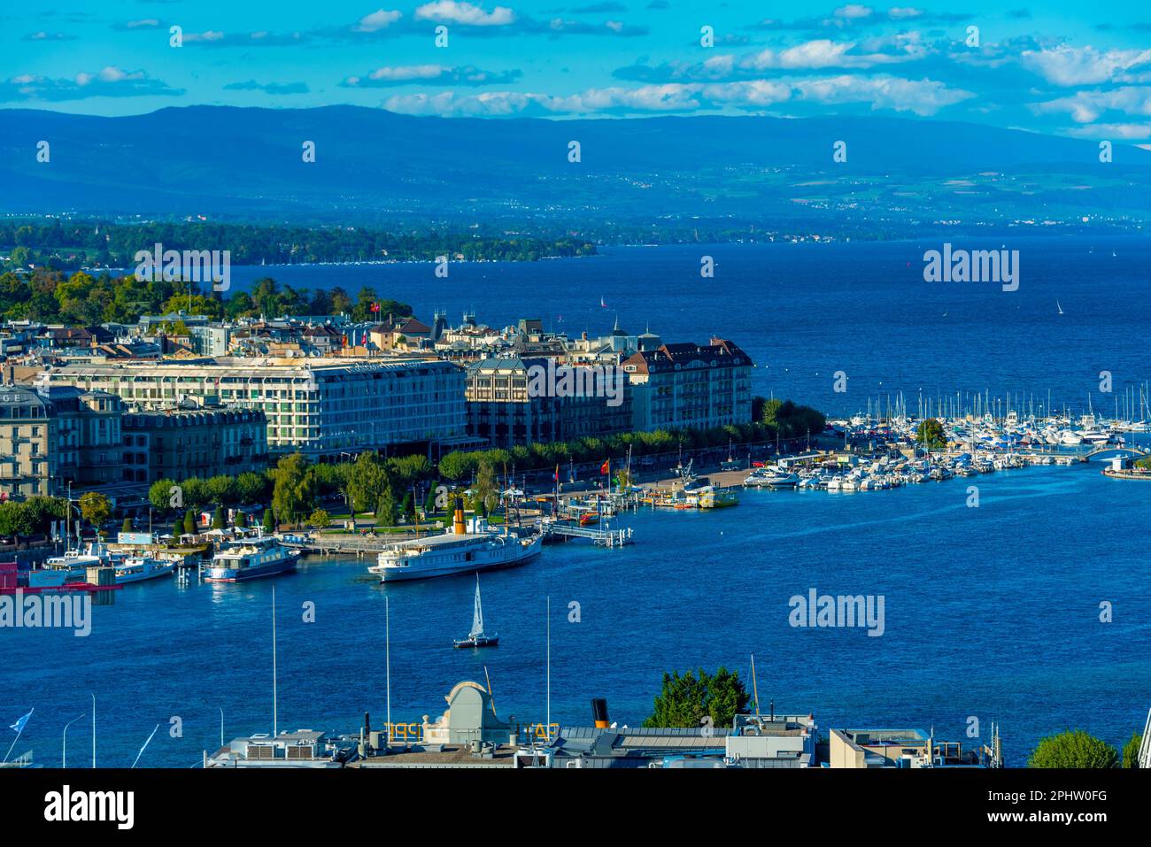 Buldings behind a lakeside promenade of the swiss city Geneva ...