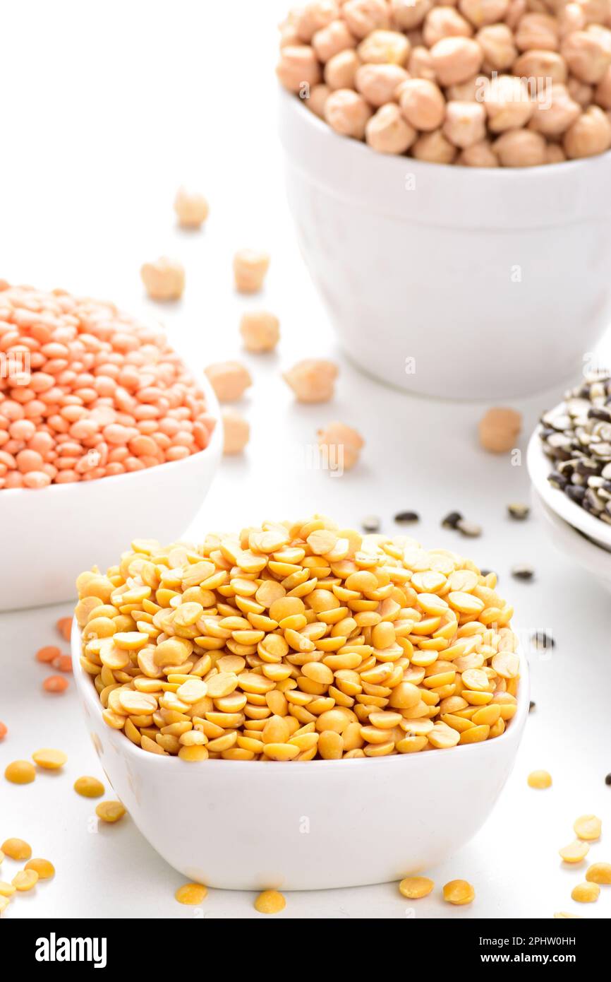 Raw chana dal in bowl on white background Stock Photo - Alamy