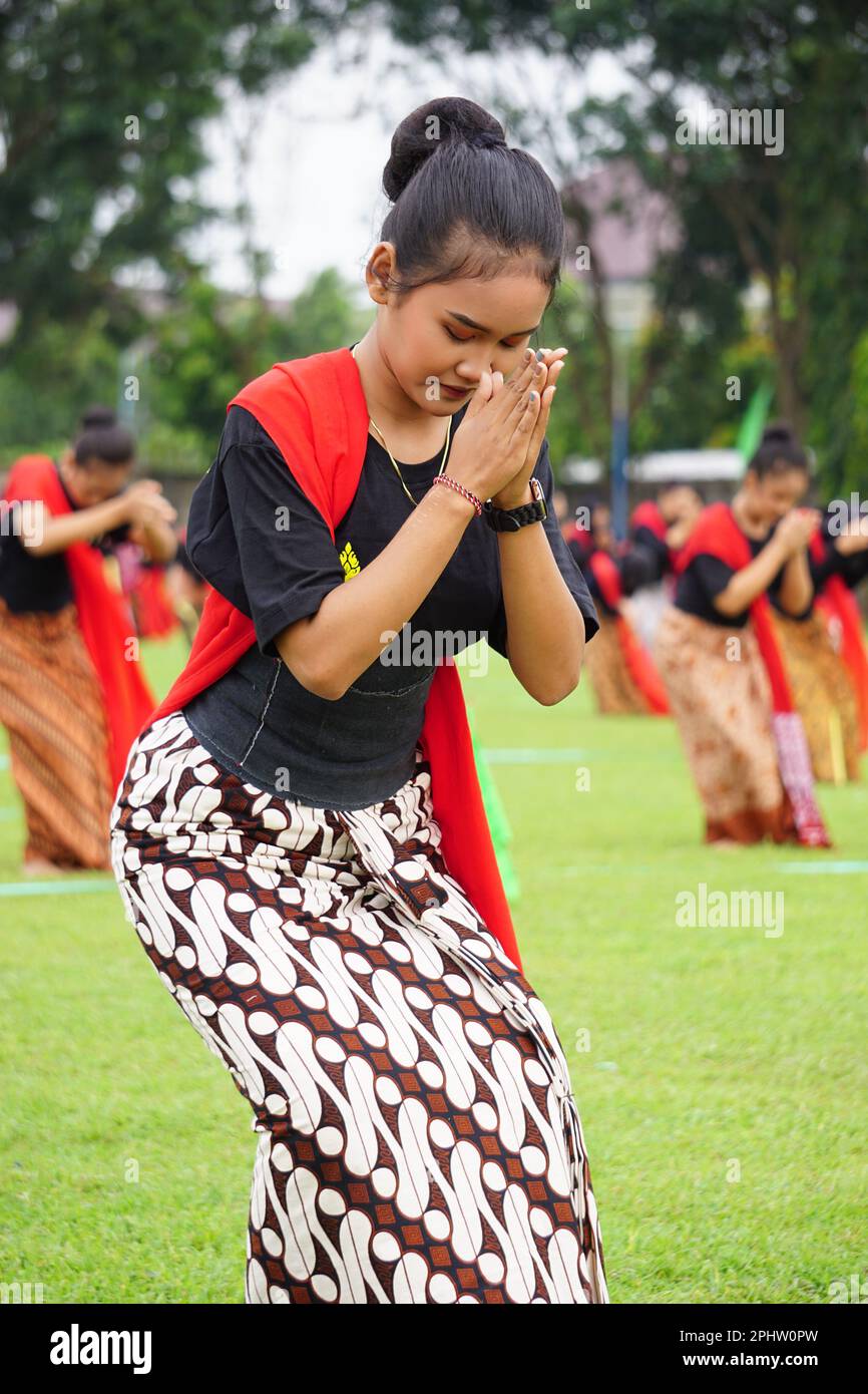 Indonesian performing gambyong dance. This dance comes from central ...