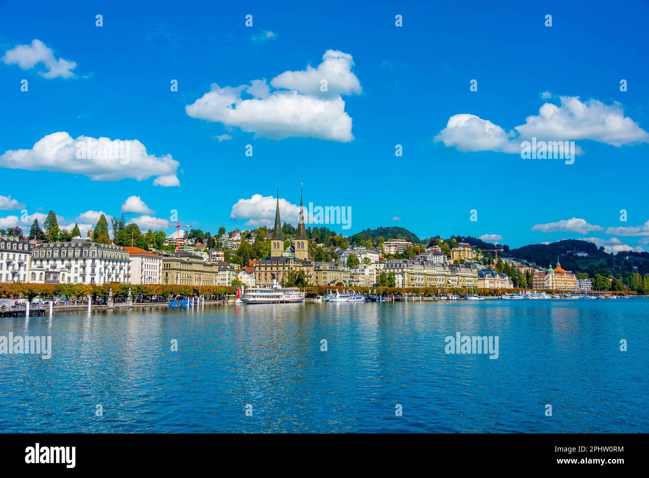 Waterfront of lake Lucerne with a church in Luzern, Switzerland Stock ...