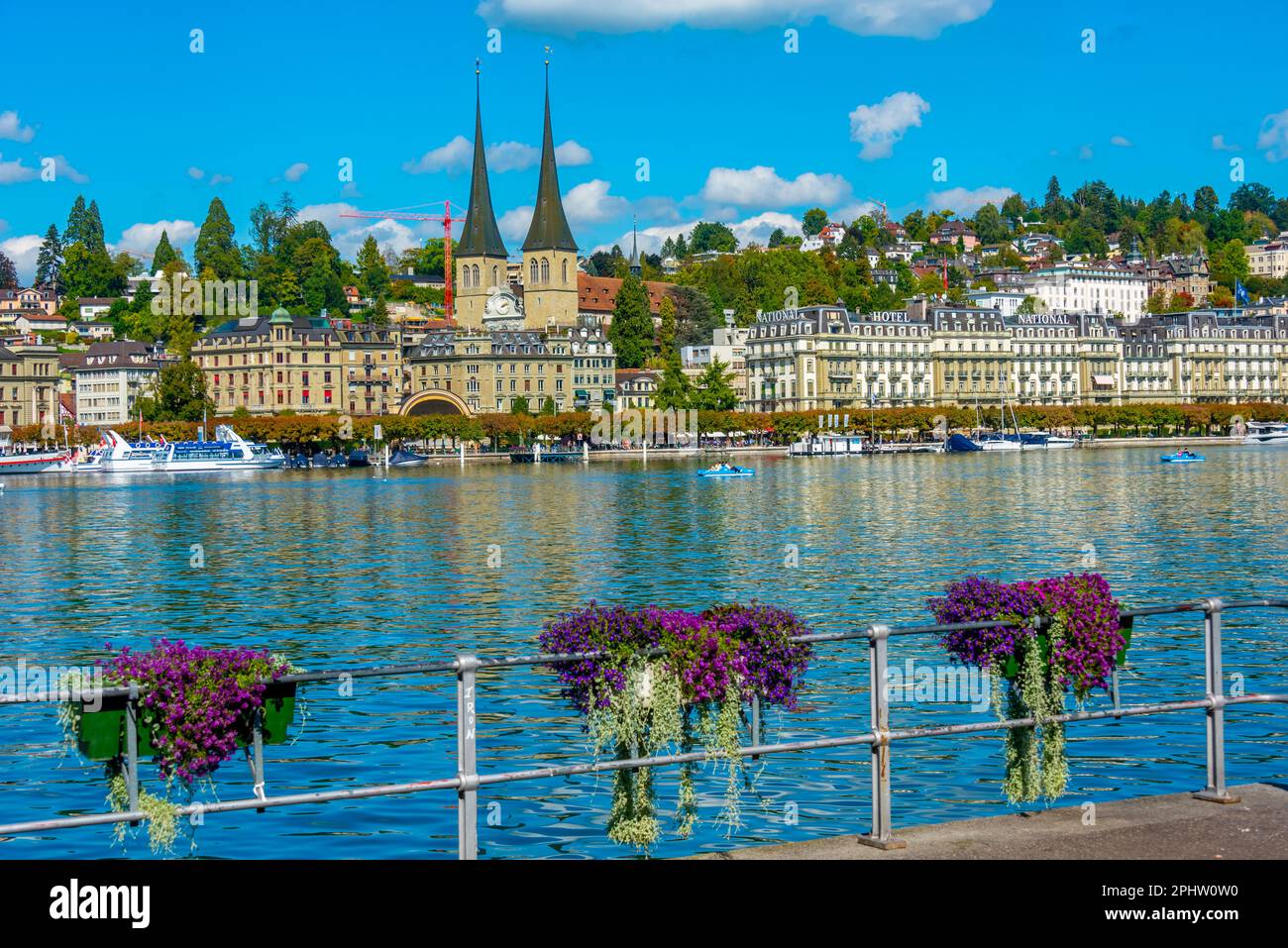Waterfront of lake Lucerne with a church in Luzern, Switzerland Stock ...