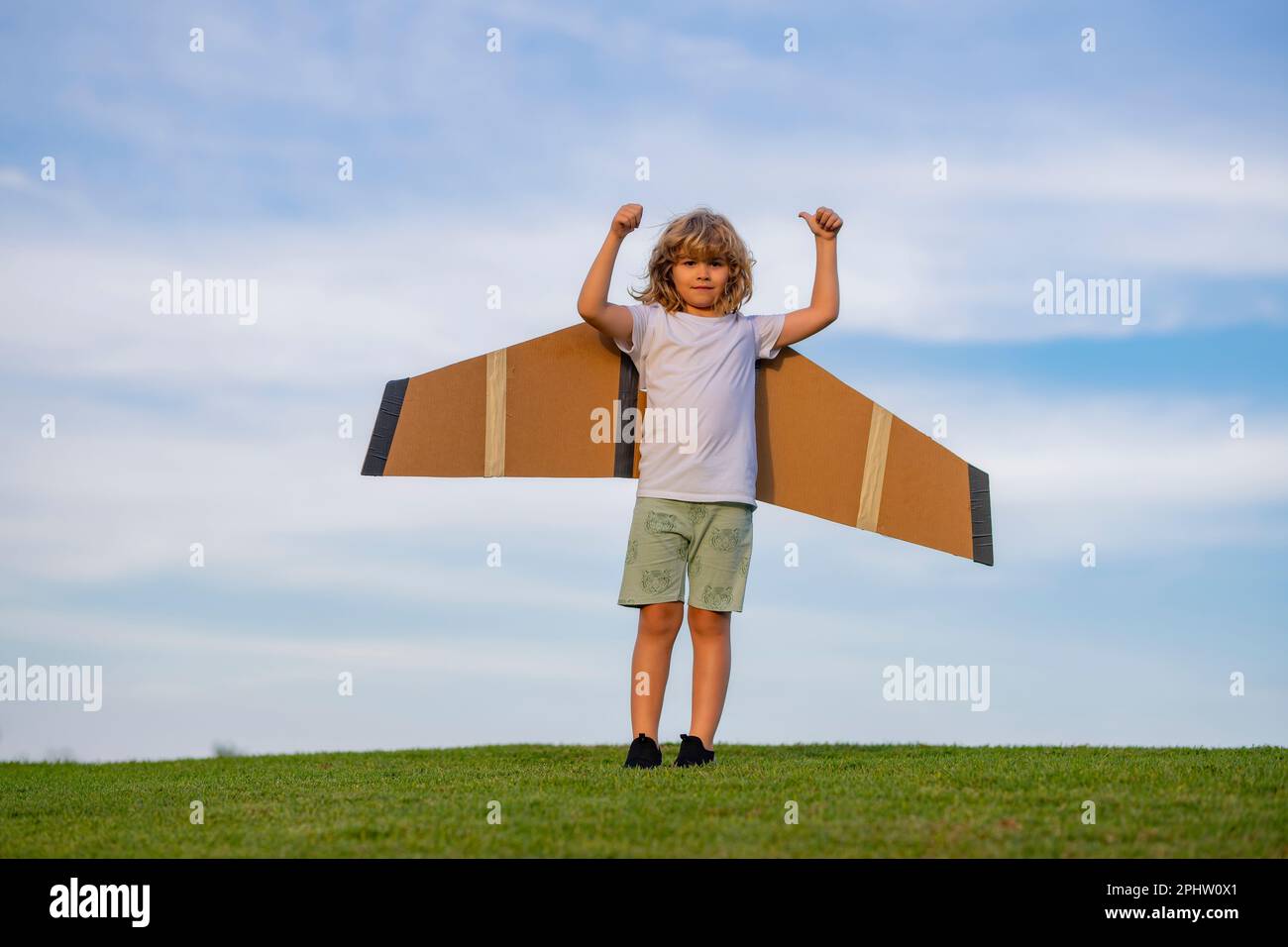 Success and child leader concept. Child pilot aviator with with paper ...