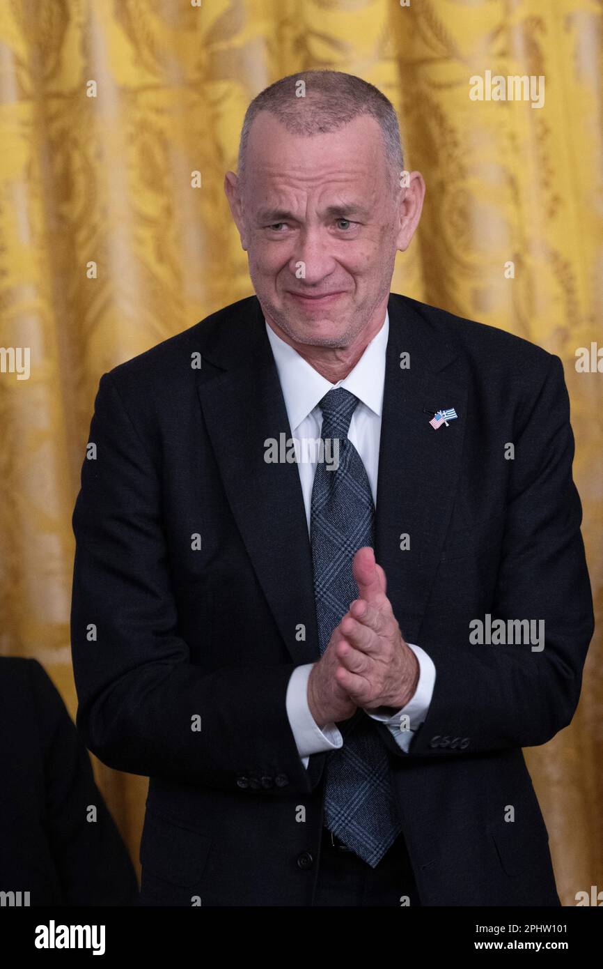 Washington, DC. 29th Mar, 2023. Actor Tom Hanks takes the stage after ...