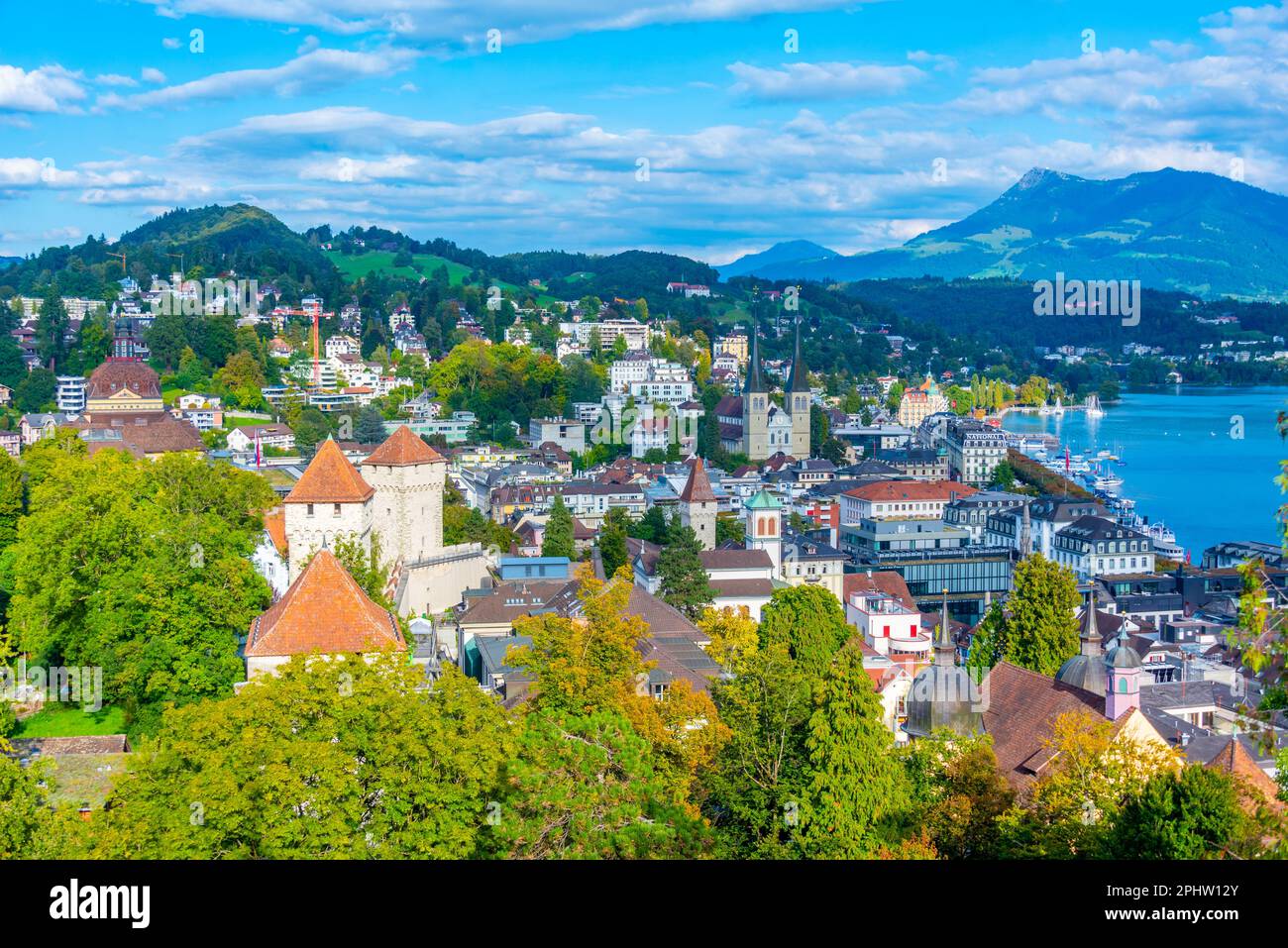 Waterfront of lake Lucerne with a church in Luzern, Switzerland Stock ...