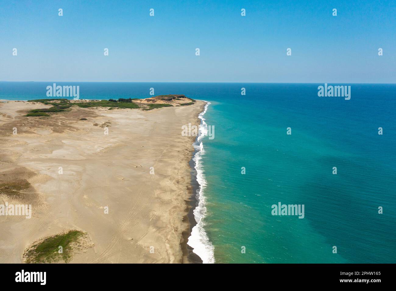 Aerial view of tropical beach and blue sea. Paoay Sand Dunes, Ilocos ...