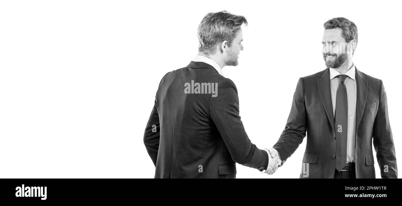 two businessmen colleagues shaking hands after successful business deal ...