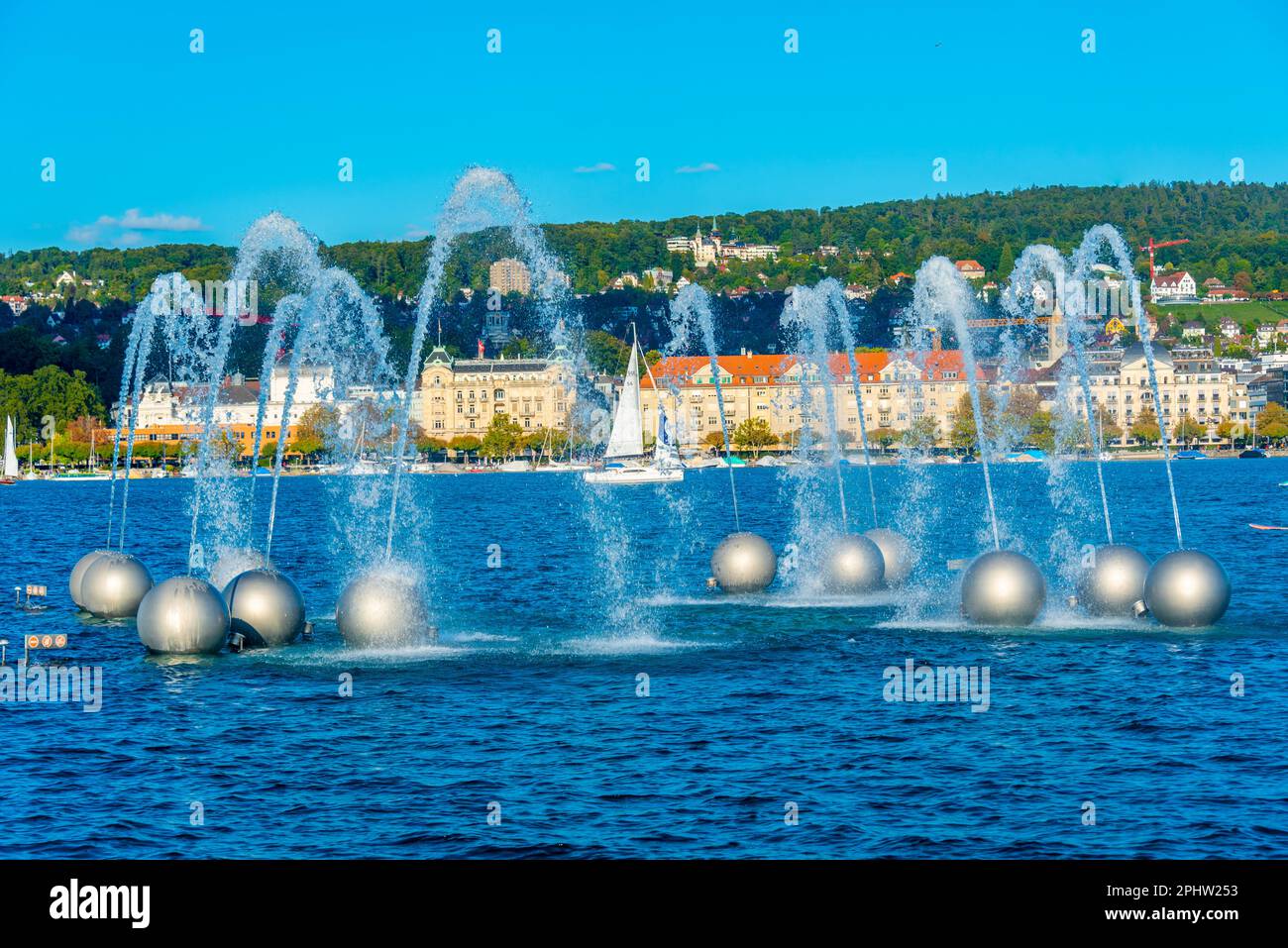 Panorama of Swiss town Zuerich behind Springbrunnen fountain Stock ...