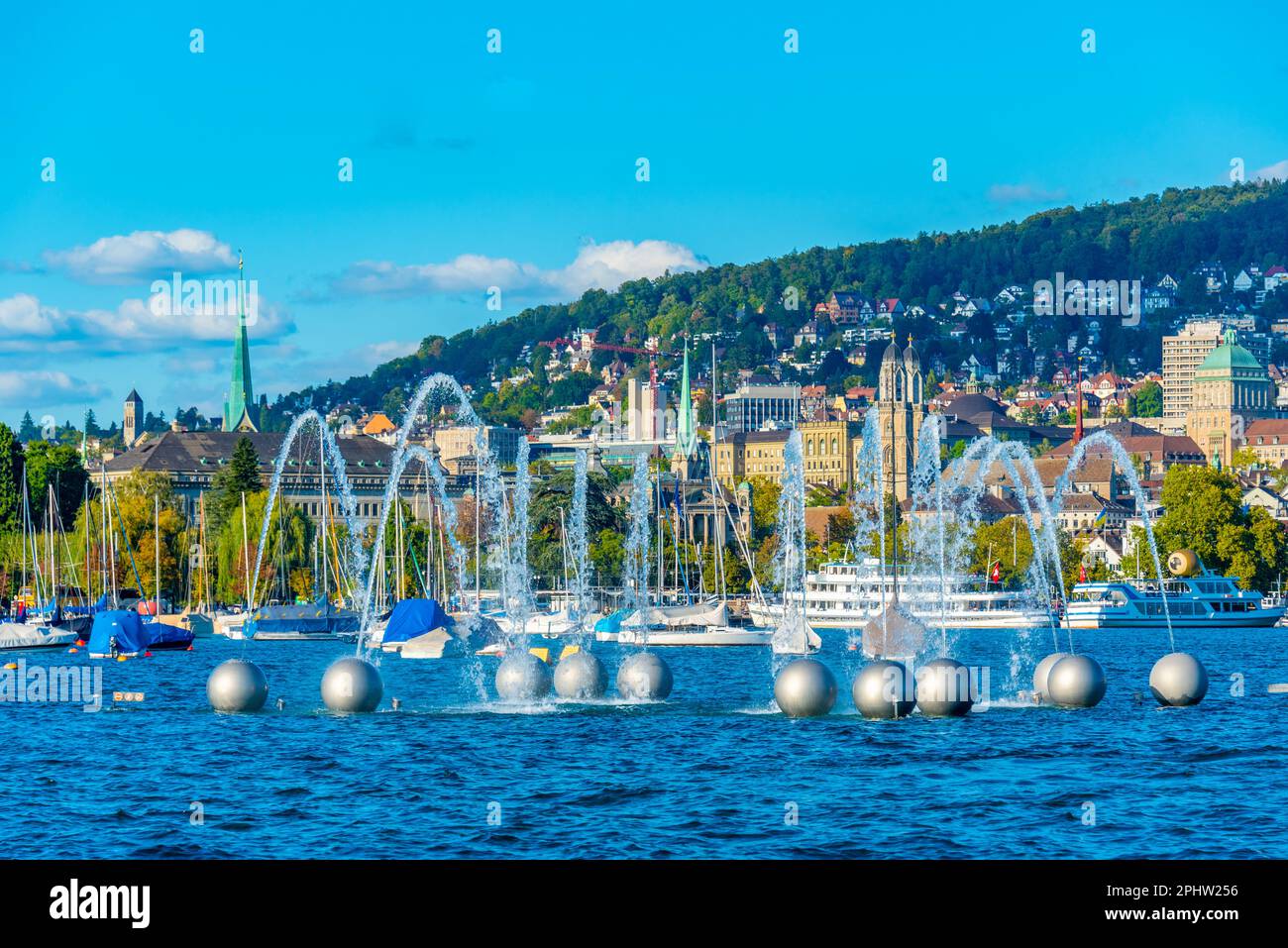 Panorama of Swiss town Zuerich behind Springbrunnen fountain Stock ...