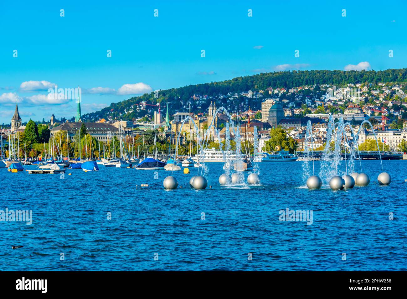 Panorama of Swiss town Zuerich behind Springbrunnen fountain Stock ...